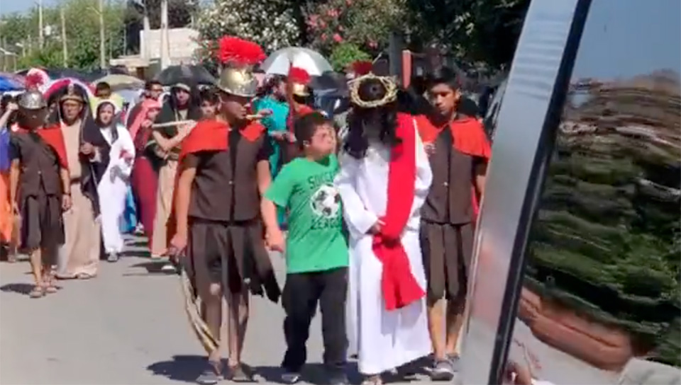 'Beautiful': boy with Down Syndrome comforts Jesus in Good Friday ...